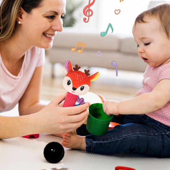 Hochet bébé - le renne développement cognitif et moteur – Jeux jouets à moi